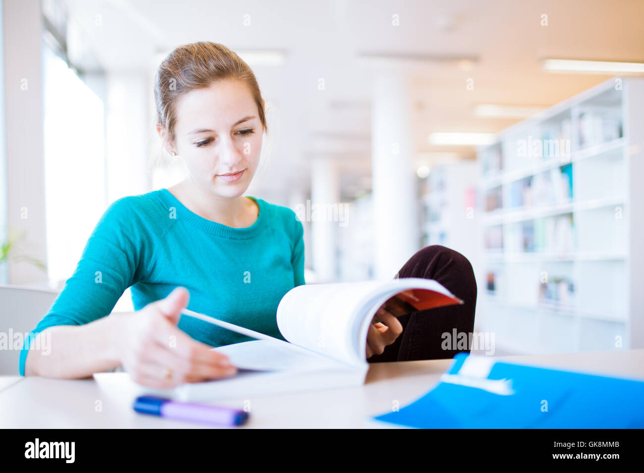 female library student Stock Photo - Alamy
