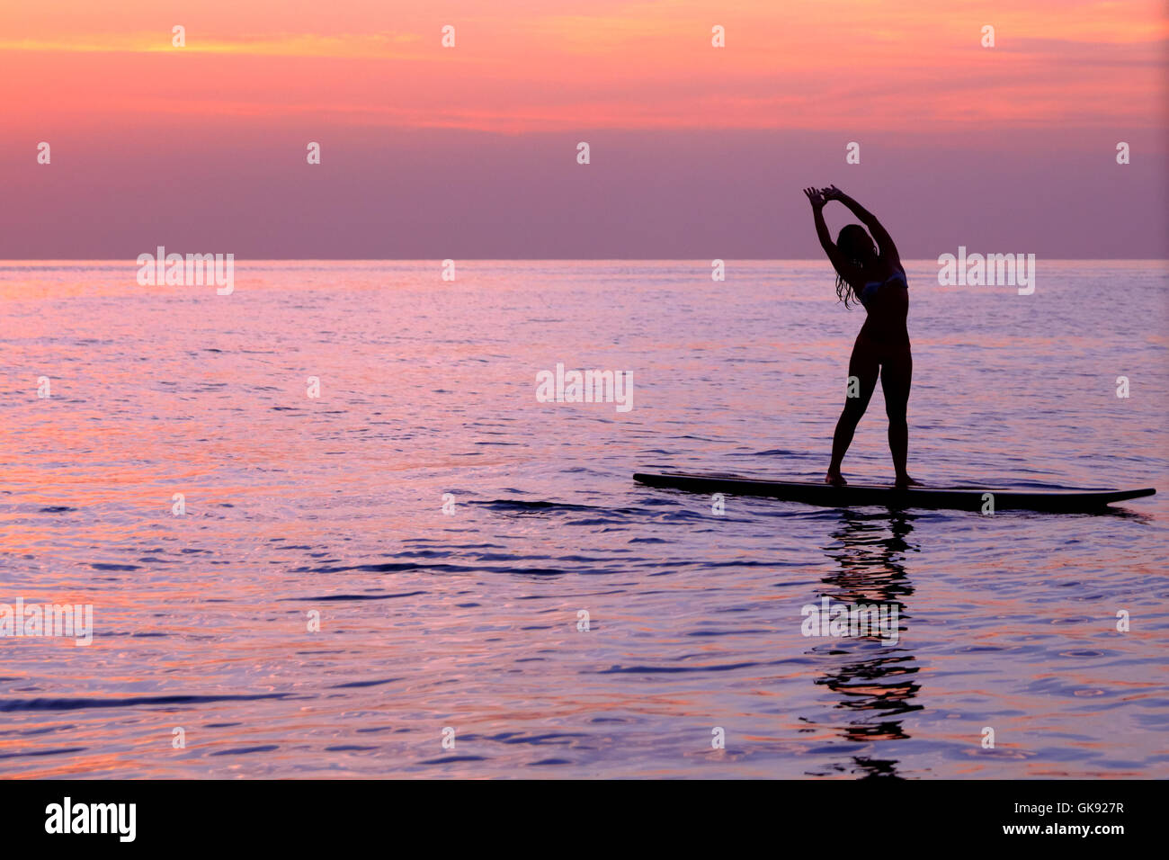 Balancing on a surf board hi-res stock photography and images - Alamy