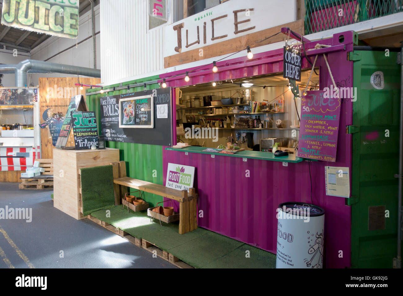Organic root food and juice stall in new street food eatery in rough ...