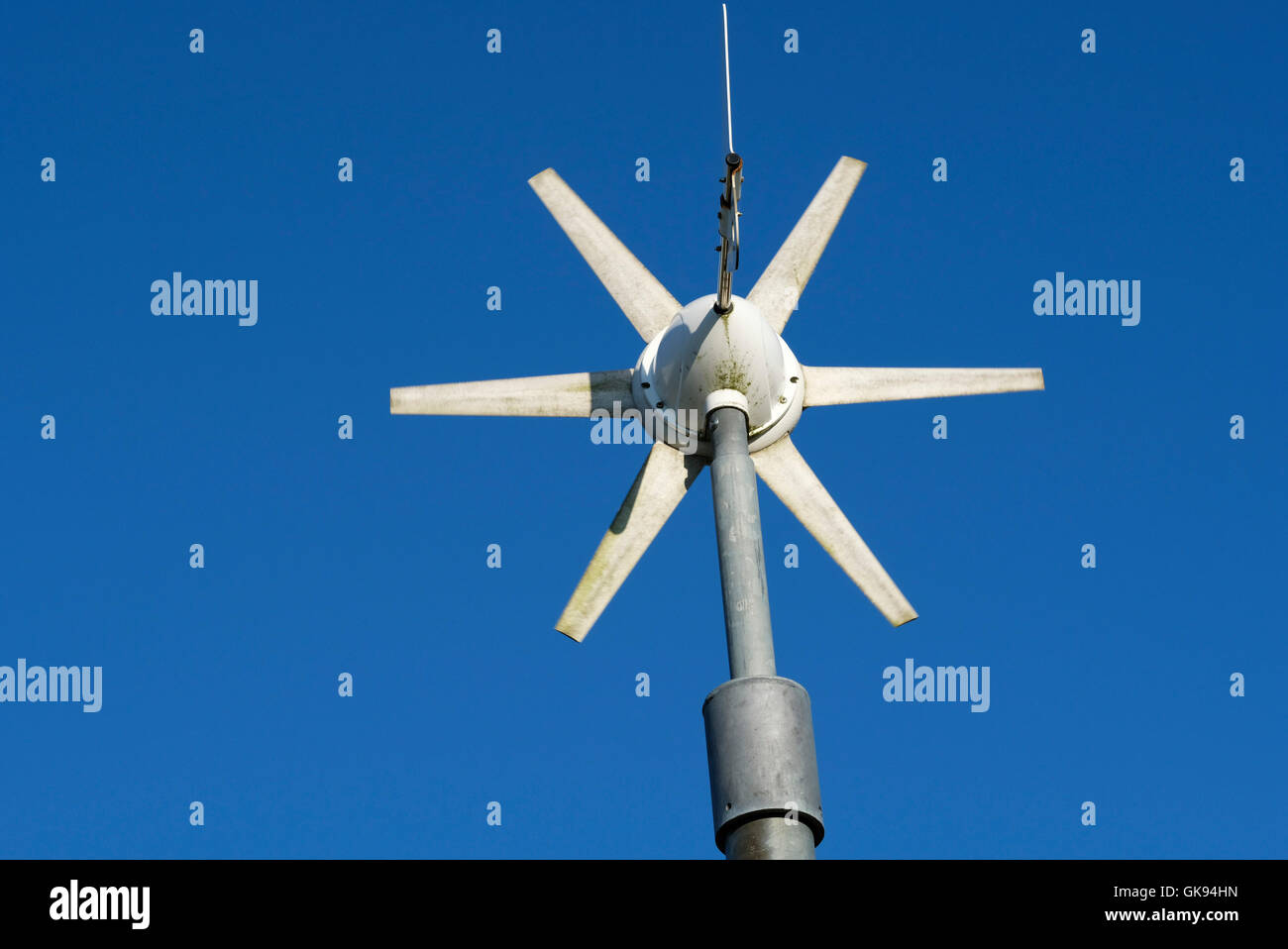 wind and solar turbine and the sun Stock Photo - Alamy