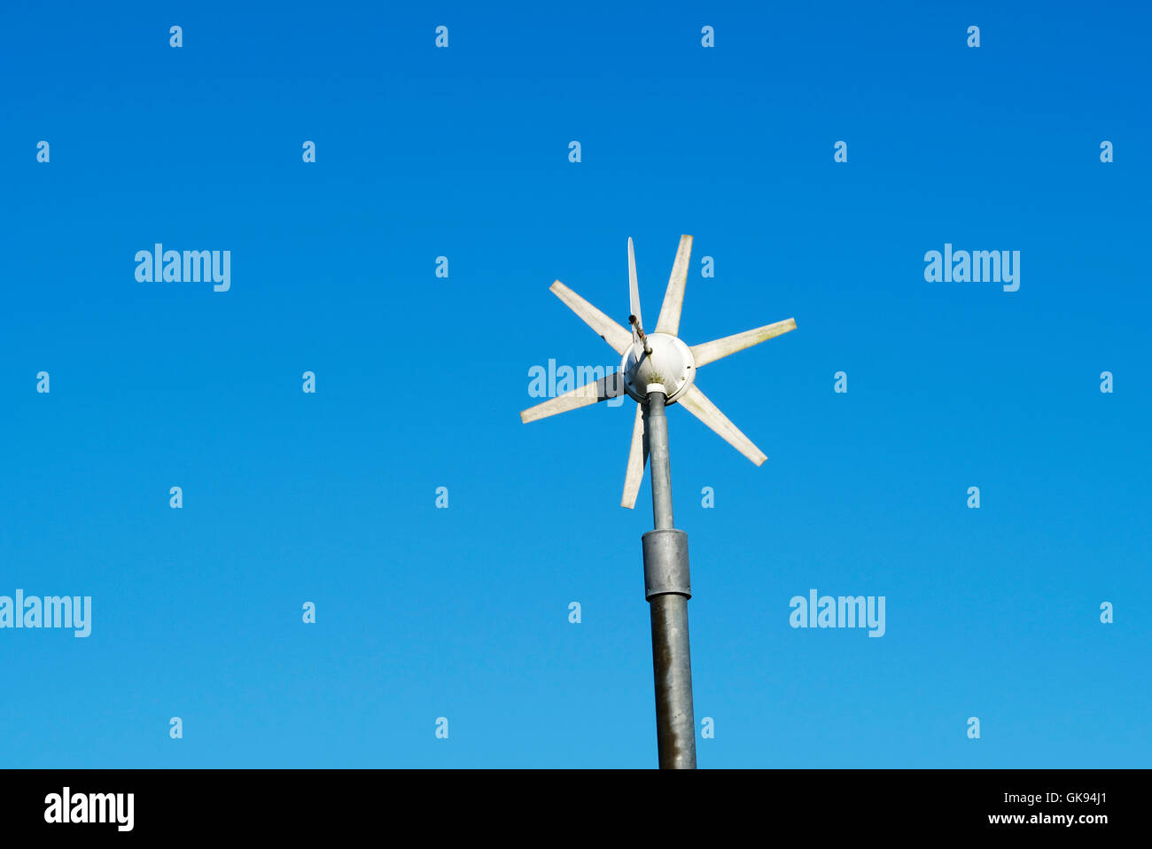 wind and solar turbine and the sun Stock Photo - Alamy