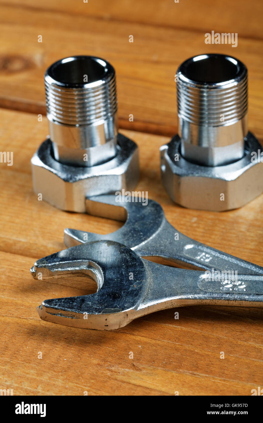 Wrenches with bolts on a desktop Close-up Stock Photo - Alamy