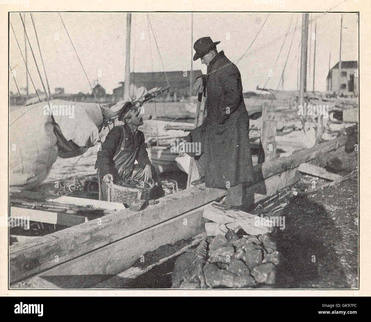 This image or document depicts the process of landing a fish catch at a ...