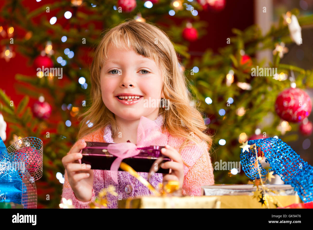 christmas - little girl with xmas Stock Photo - Alamy