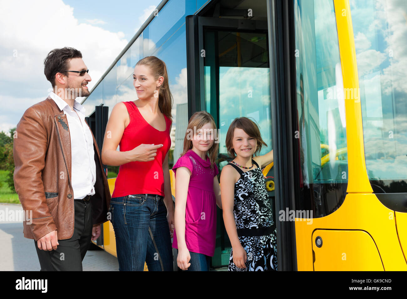 passengers climb into a bus Stock Photo - Alamy