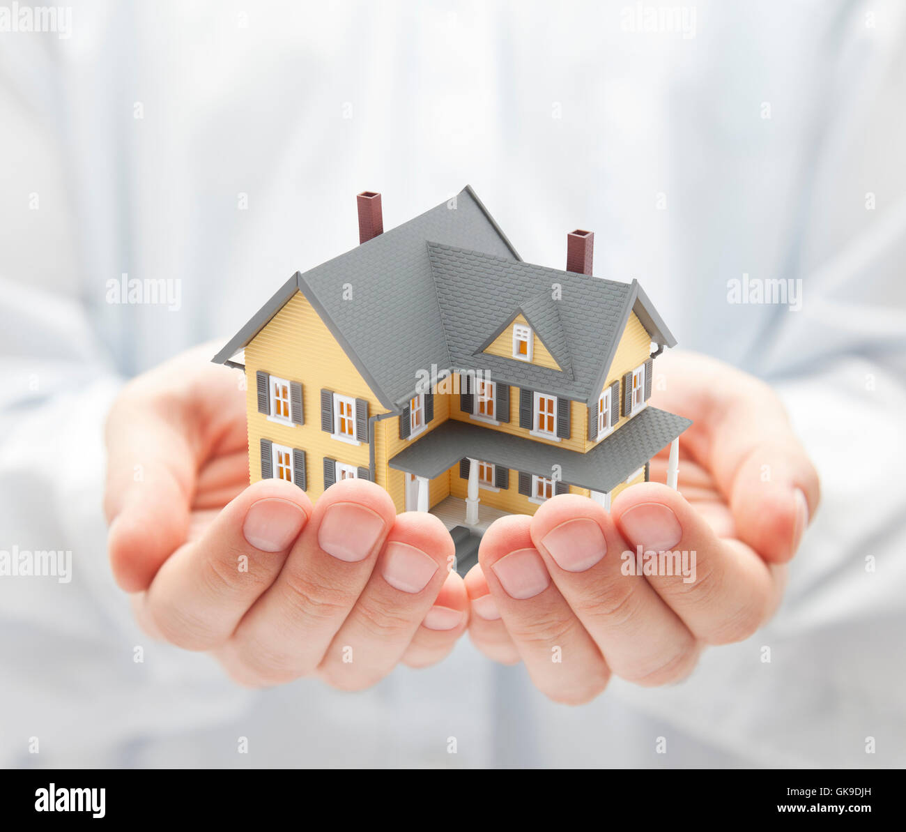 house building hand Stock Photo - Alamy