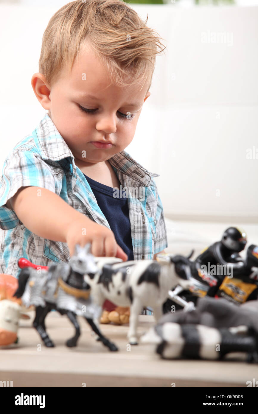 Cute serious infant blonde hair hi-res stock photography and images - Alamy
