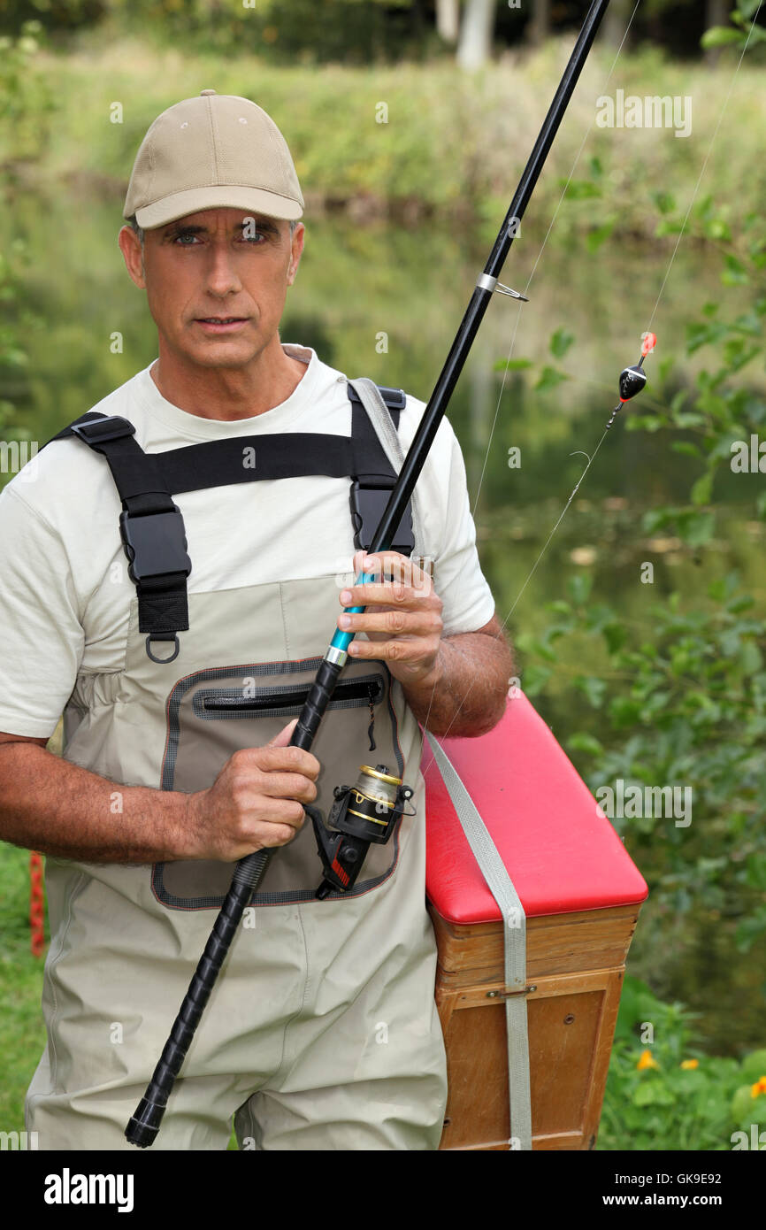 fish angle fishing Stock Photo - Alamy