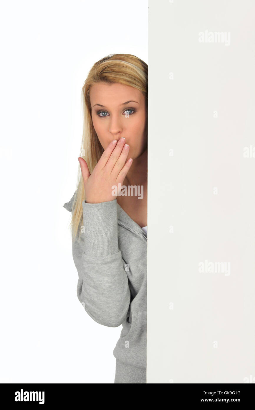 Shy girl hiding face wall hi-res stock photography and images - Alamy