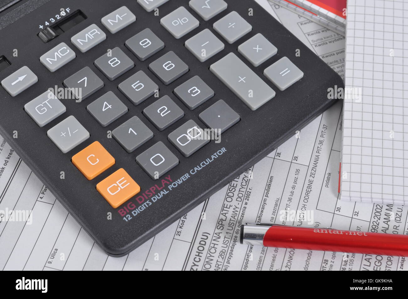 office scratchpad calculator Stock Photo - Alamy