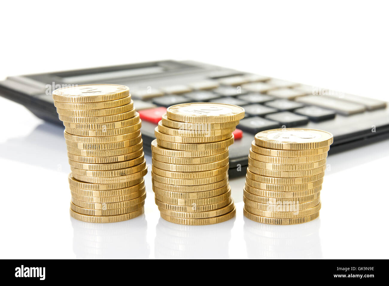 currency calculator coin Stock Photo - Alamy