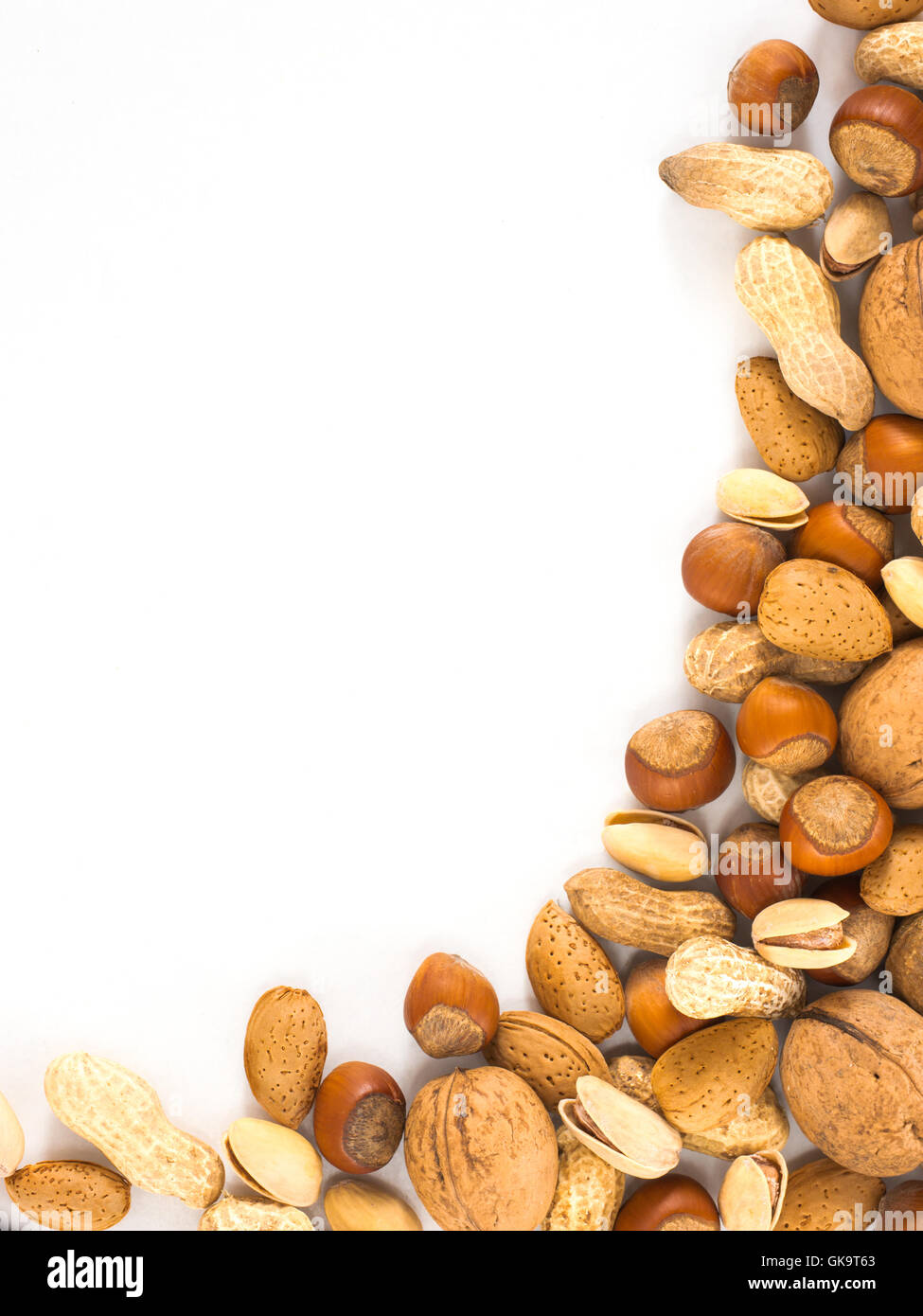 Background of mixed nuts with copy space Stock Photo - Alamy