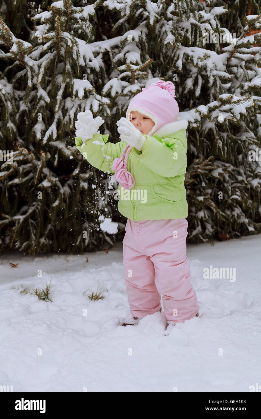 Child girl shovel snow hi-res stock photography and images - Alamy