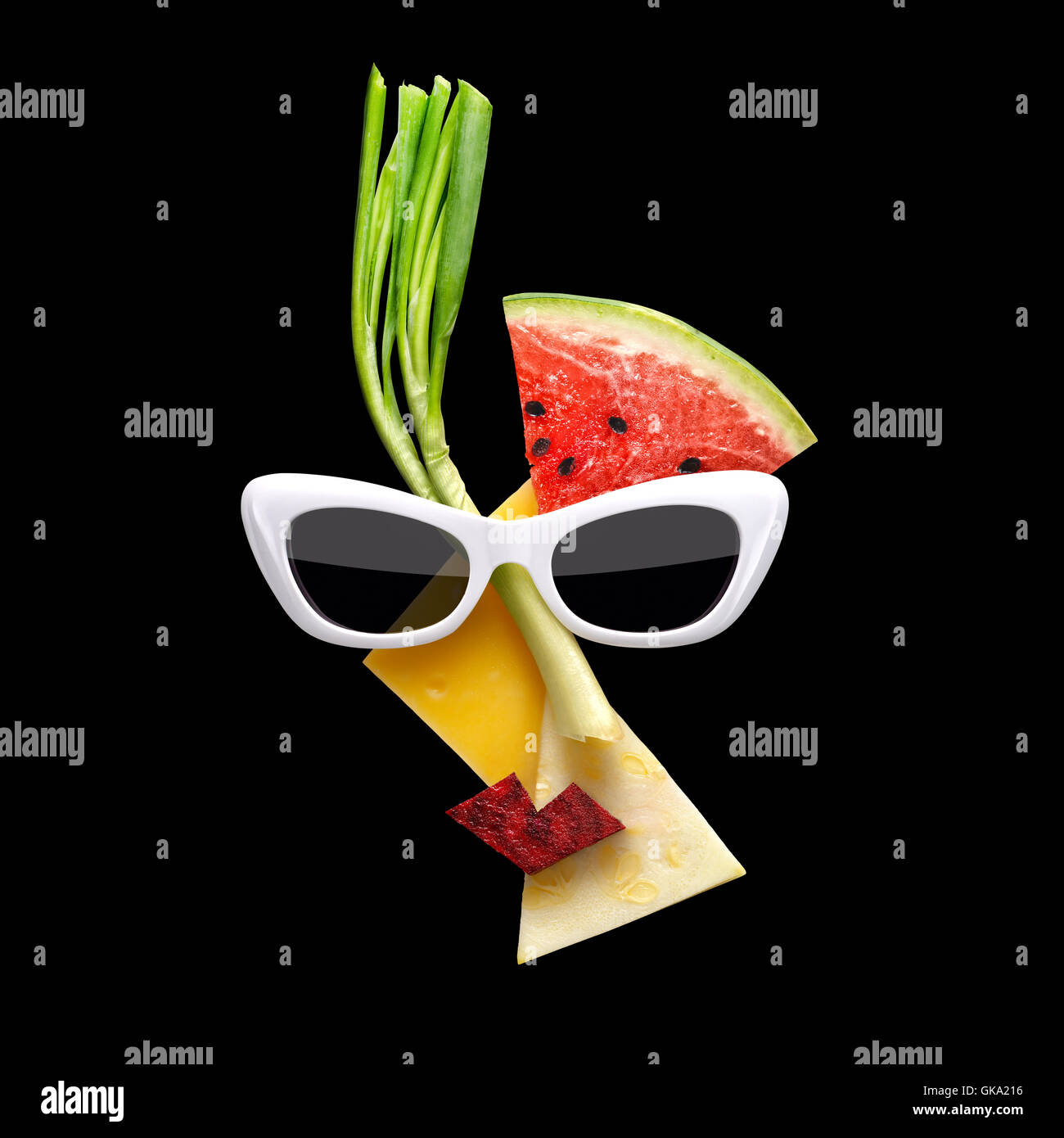 Quirky food concept of cubist style female face in sunglasses made of ...