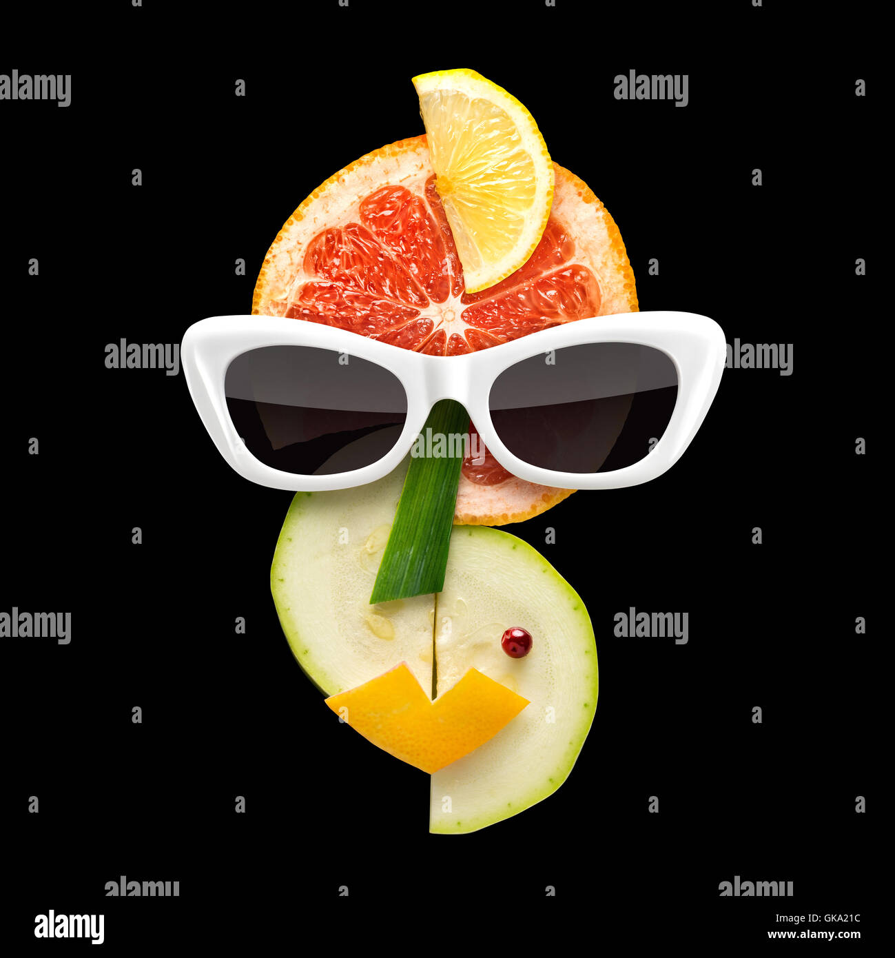 Quirky food concept of cubist style female face in sunglasses made of ...