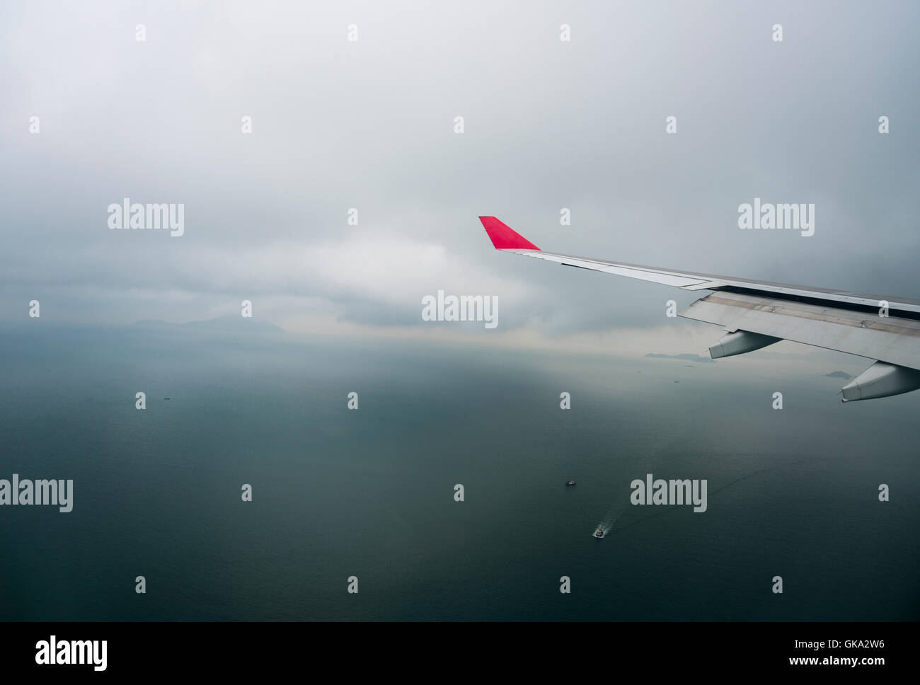 Under the wing of the airplane sky Stock Photo - Alamy