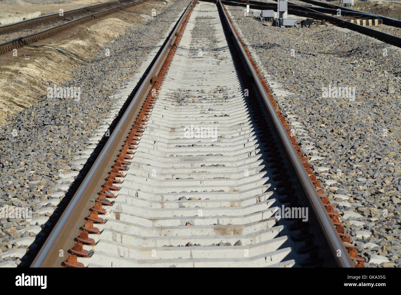 Railroad tracks at the train station. The new railway Stock Photo - Alamy