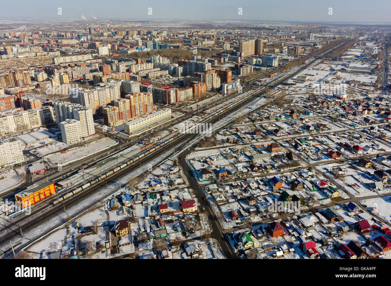 Train between old and new districts of Tyumen city Stock Photo - Alamy