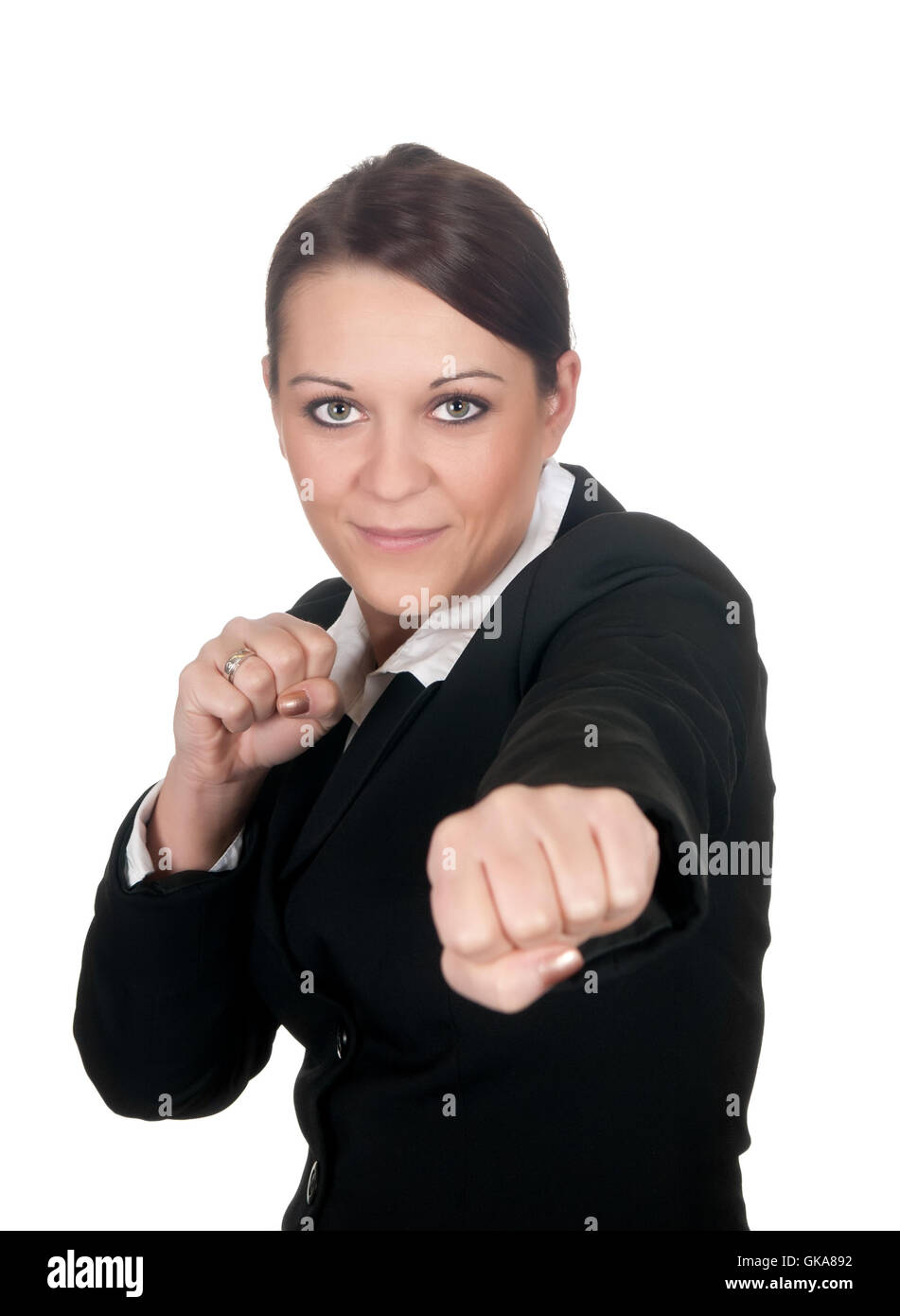 Aggressive young woman fighting with fist High Resolution Stock ...