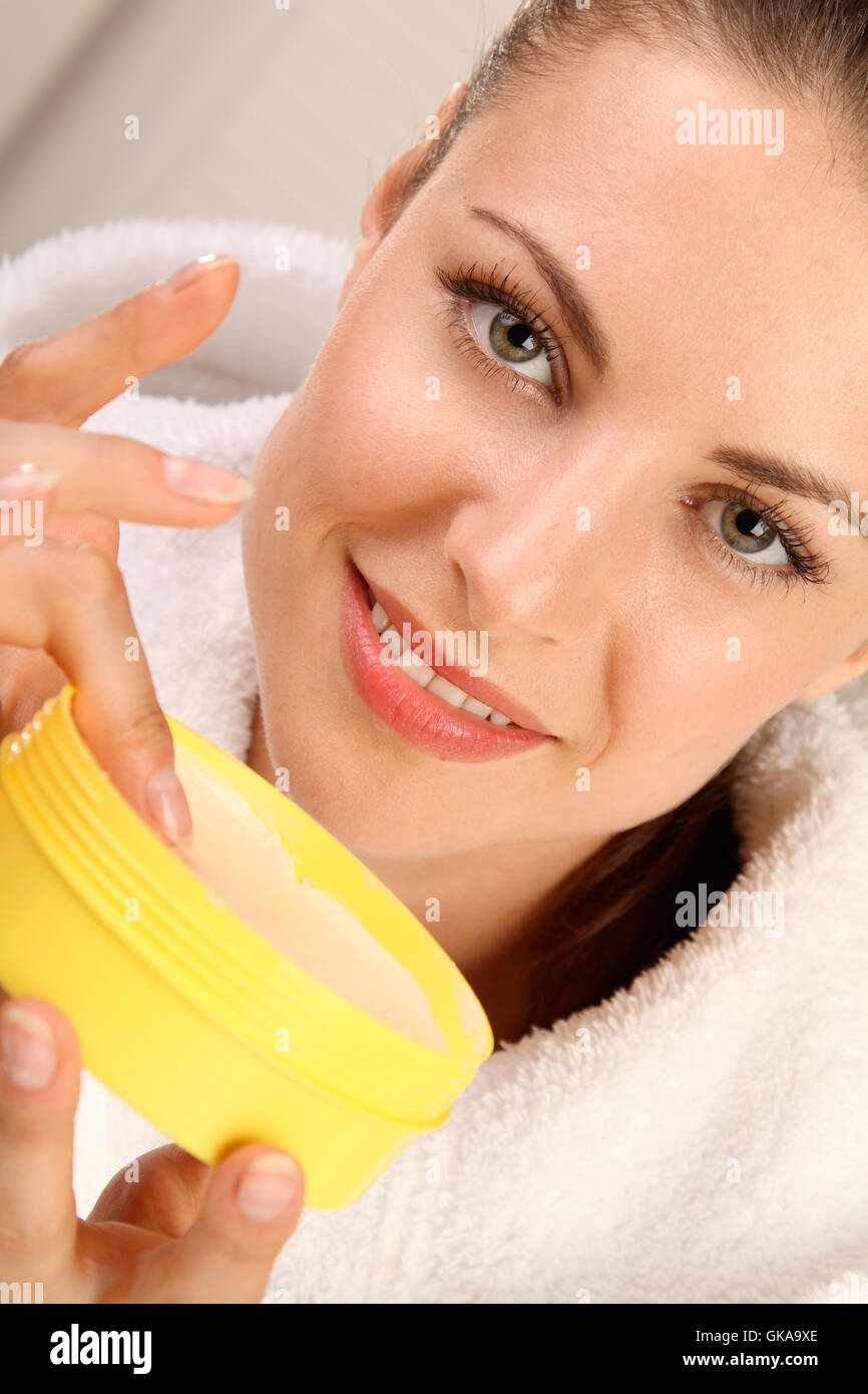 woman applying lotion Stock Photo - Alamy