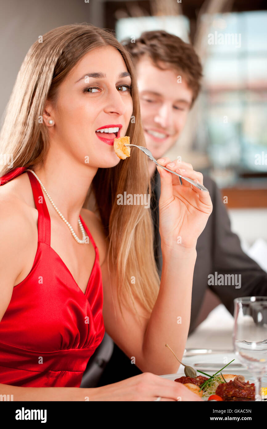 woman restaurant food Stock Photo - Alamy