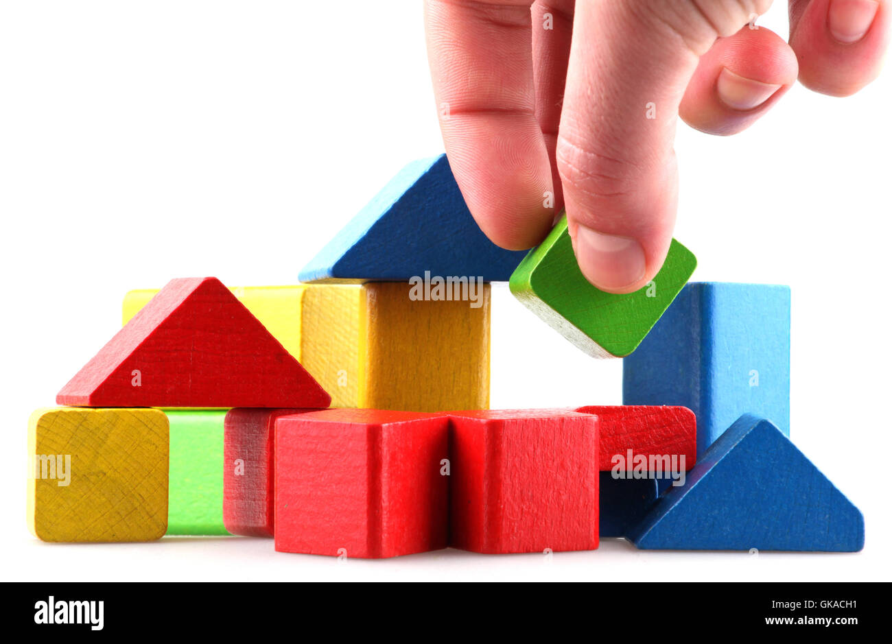 Coloured wooden block tower hi-res stock photography and images - Alamy