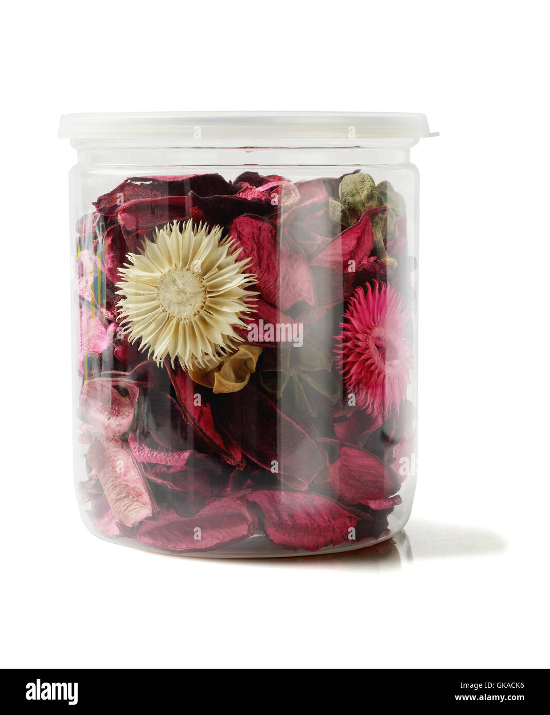 Colourful Potpourri in Plastic Container on White Background Stock ...