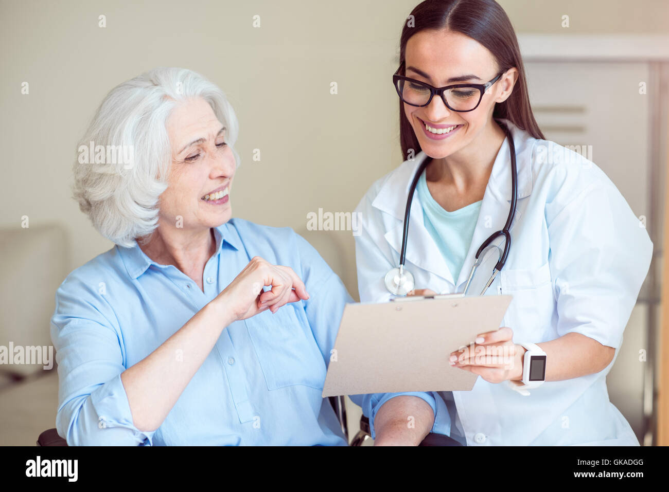 Nurse writing something down Stock Photo - Alamy