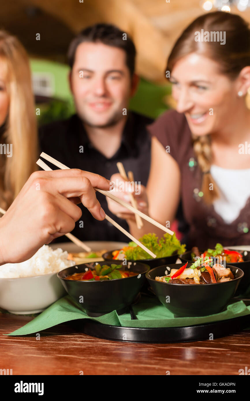 Beautiful young woman eating stick hi-res stock photography and images ...