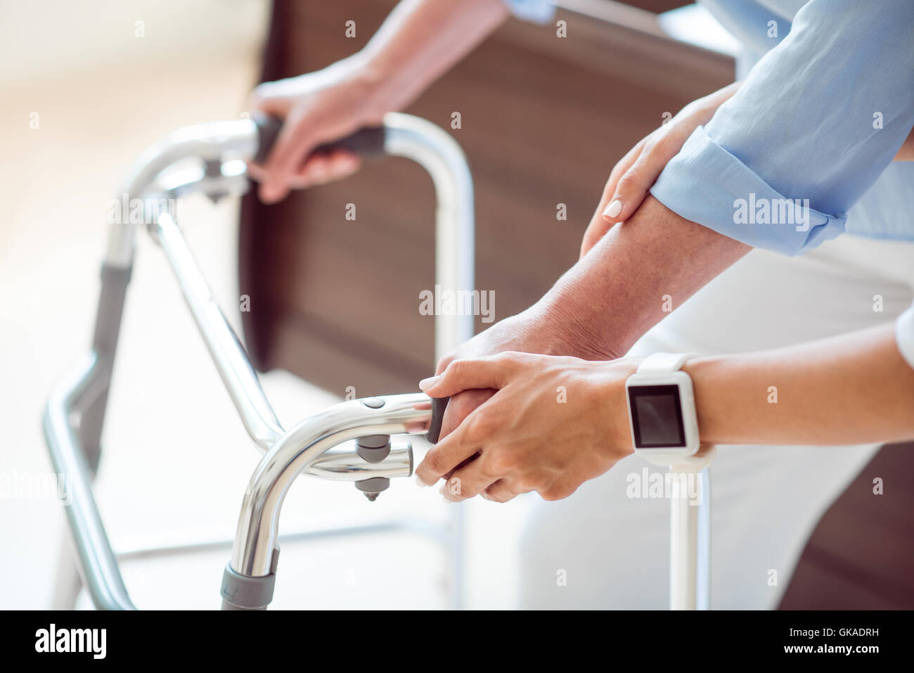 Old woman walking frame hi-res stock photography and images - Alamy