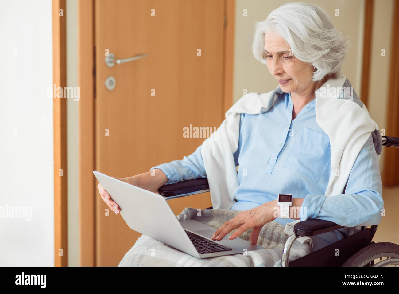 Senior female patient using computer Stock Photo - Alamy
