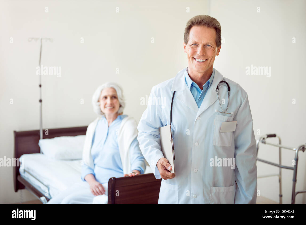 Nice doctor being at hospital ward Stock Photo - Alamy
