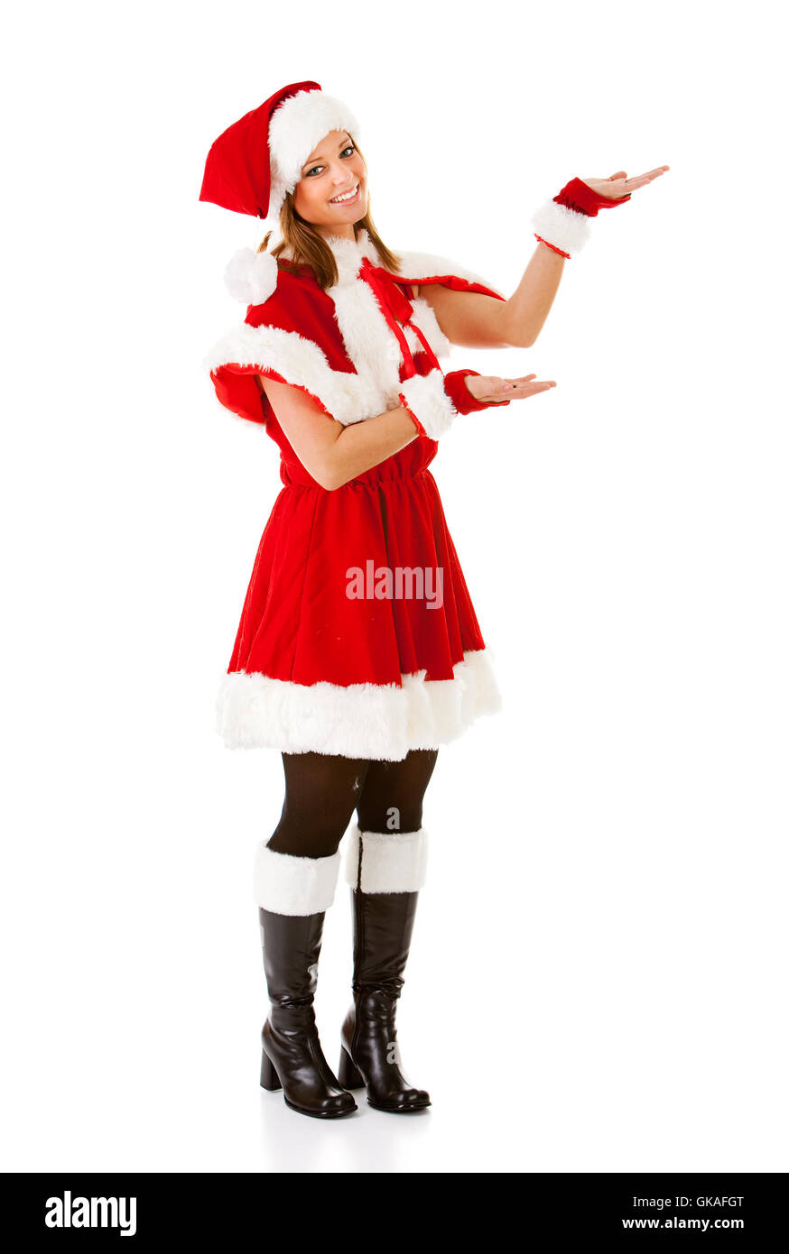 Caucasian female dressed in a cute Santa elf outfit Stock Photo - Alamy