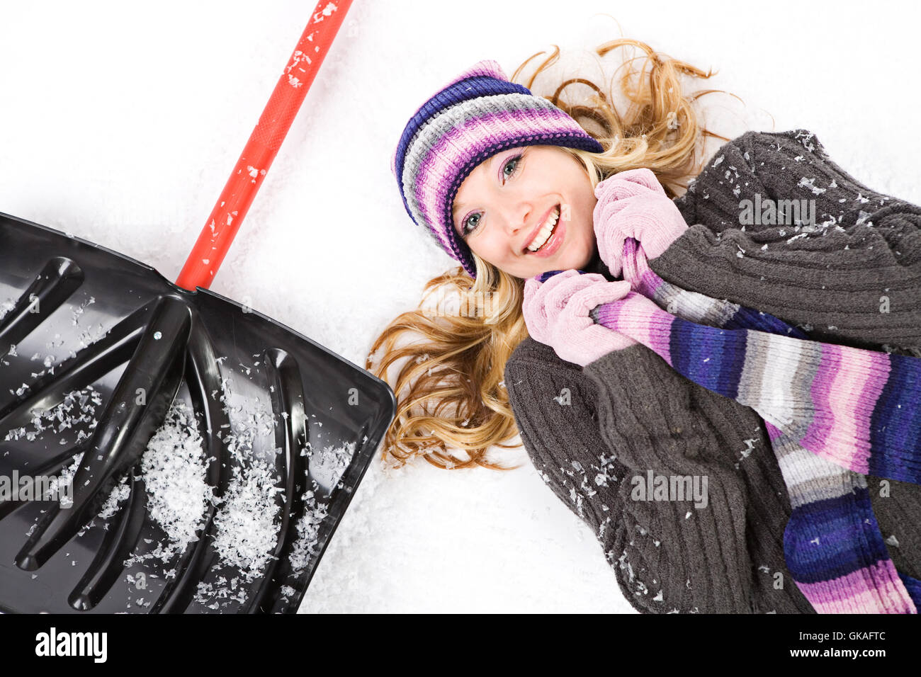 Woman snow shovel hi-res stock photography and images - Alamy