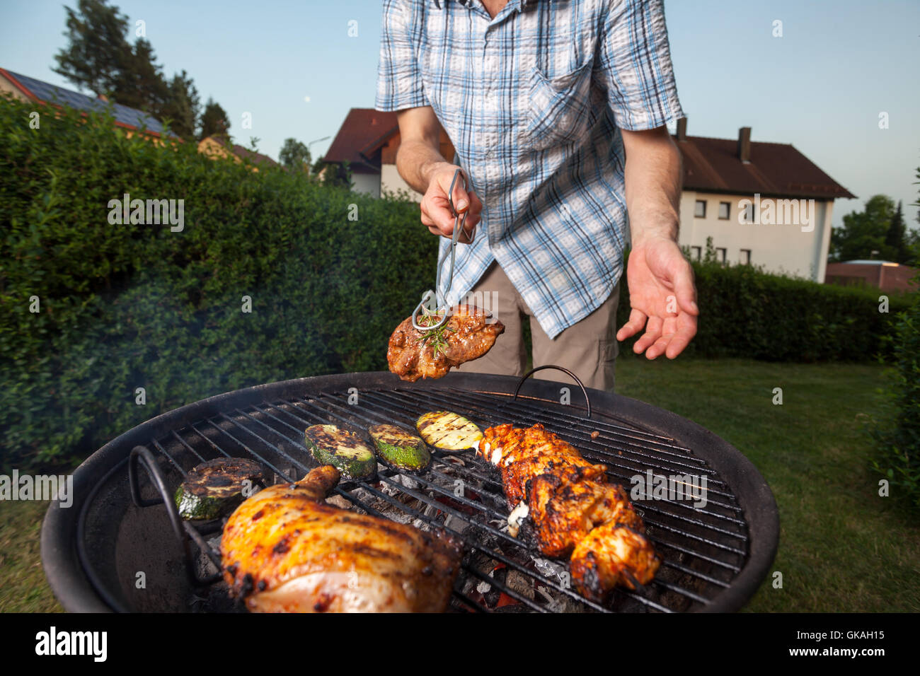 barbecue in the garden Stock Photo - Alamy