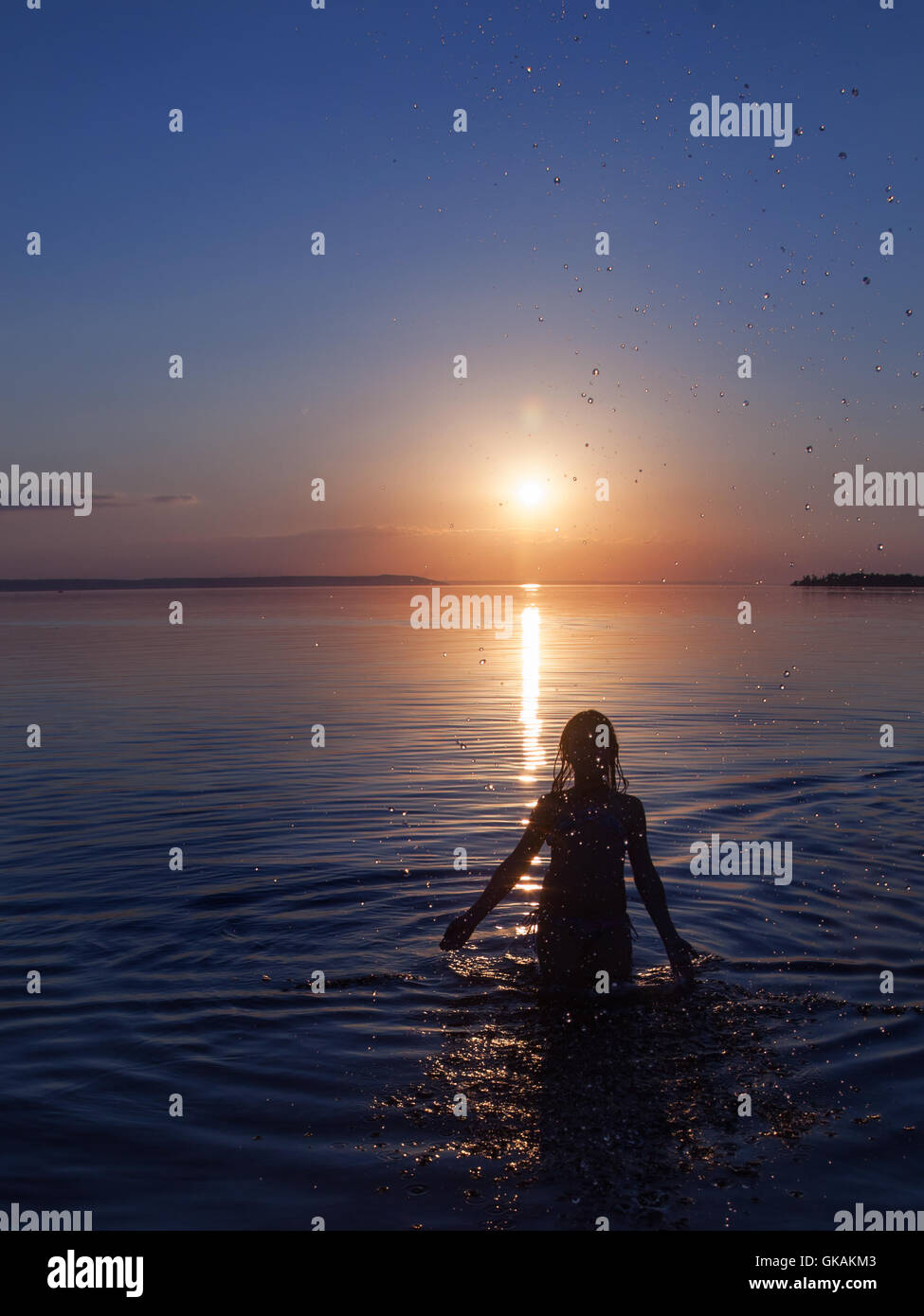 girl emotions hands at sunset Stock Photo - Alamy
