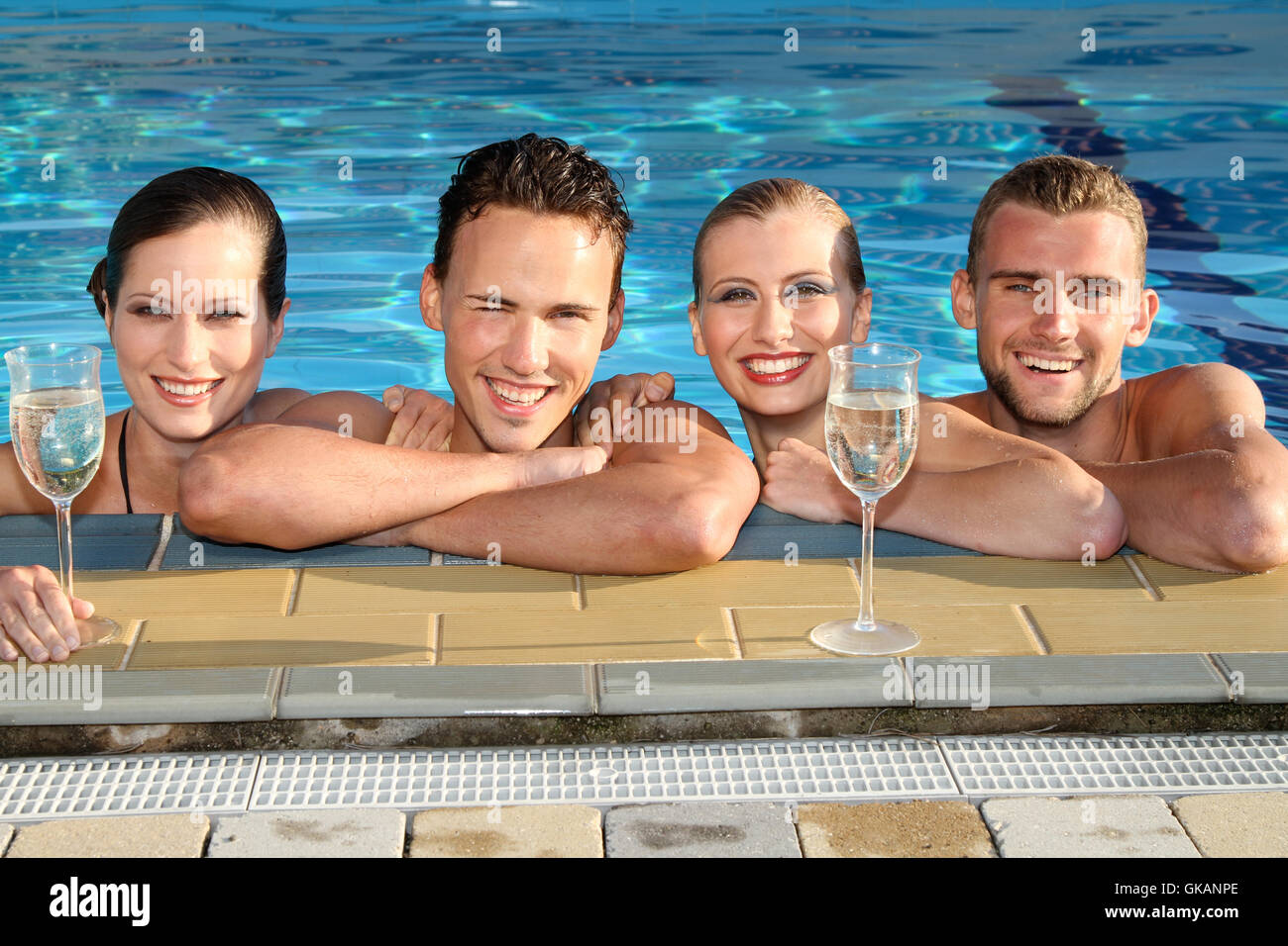 group by the pool Stock Photo - Alamy