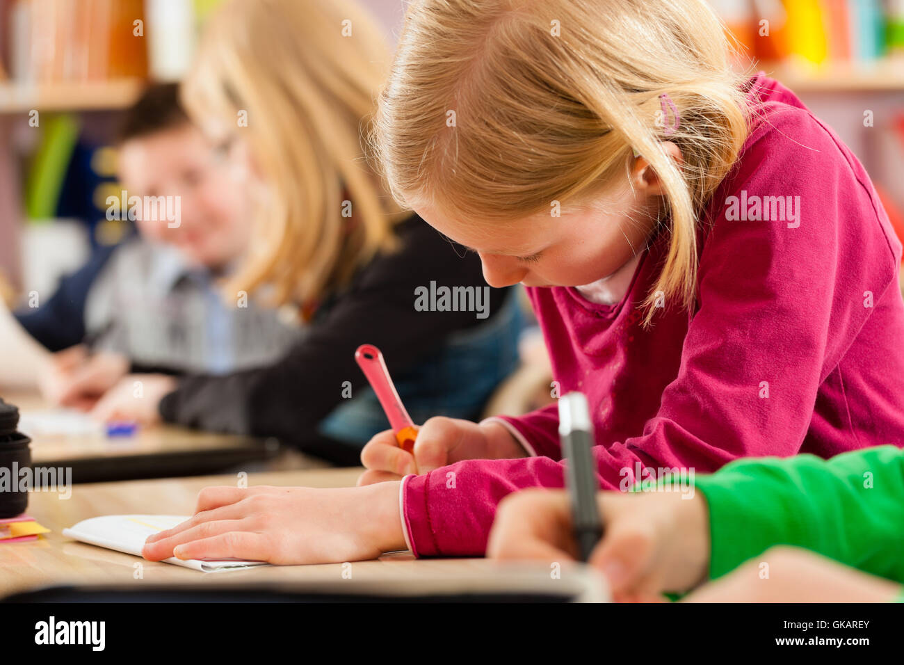 students in the school to do homework Stock Photo - Alamy