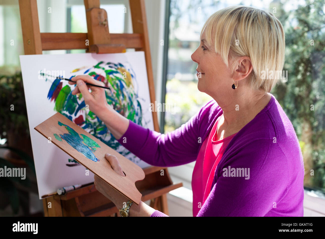 woman painting hobby Stock Photo - Alamy
