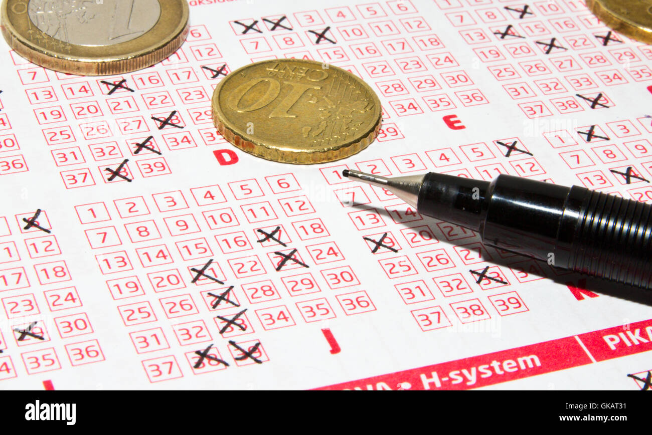 coin lottery bet Stock Photo - Alamy