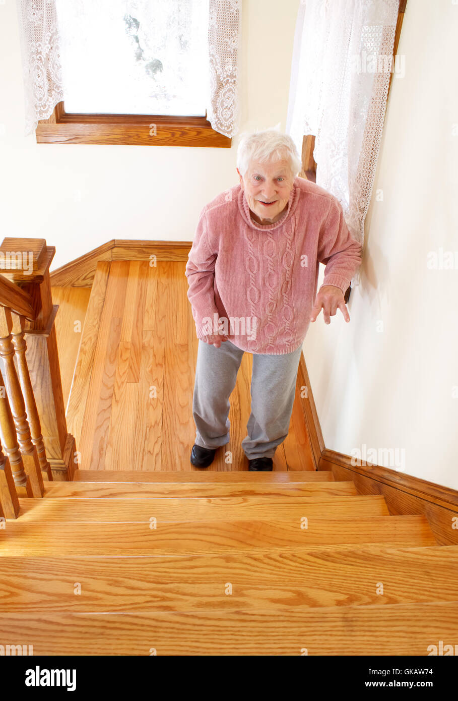 Mature Woman Climbing Stairs Stock Photos & Mature Woman Climbing ...