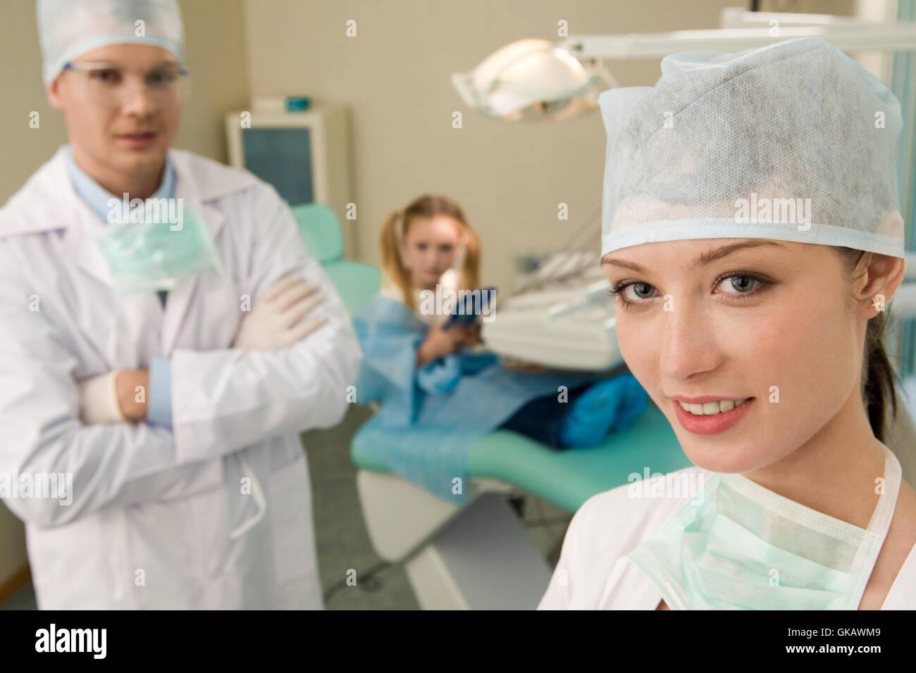 Young nice doctor watching patient hi-res stock photography and images ...