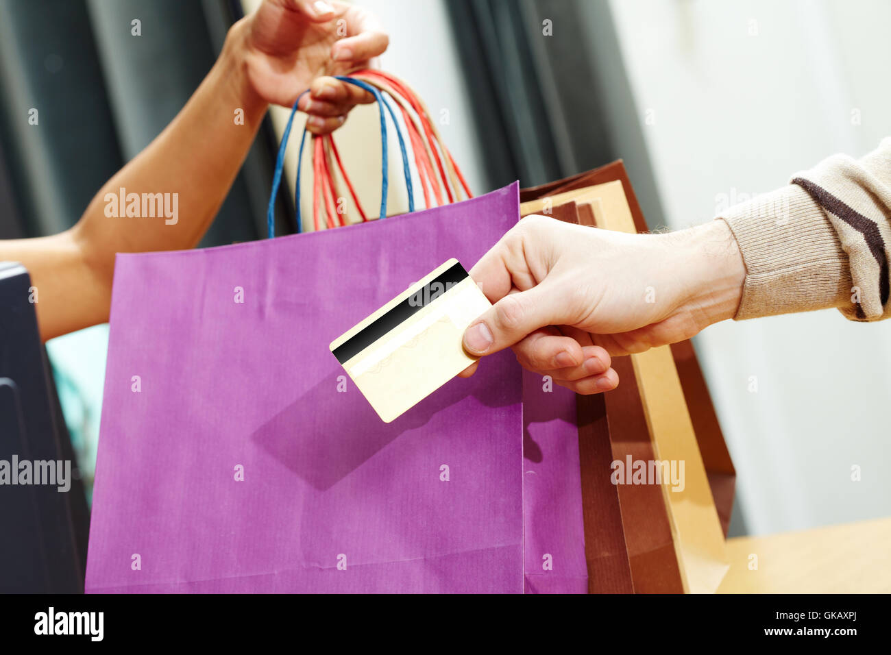 pay hand finger Stock Photo - Alamy