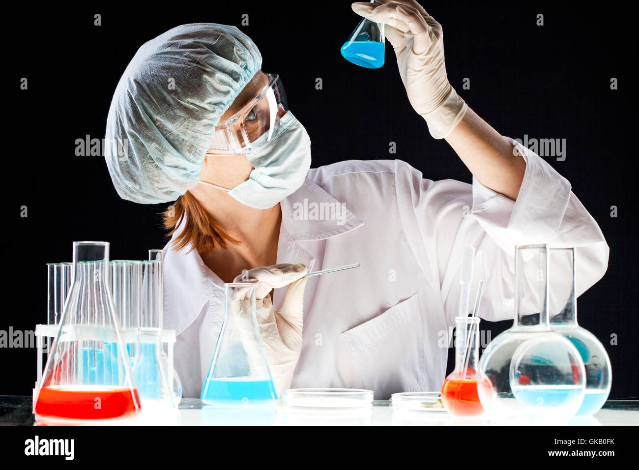 Adult doctor holds test tube hi-res stock photography and images - Alamy