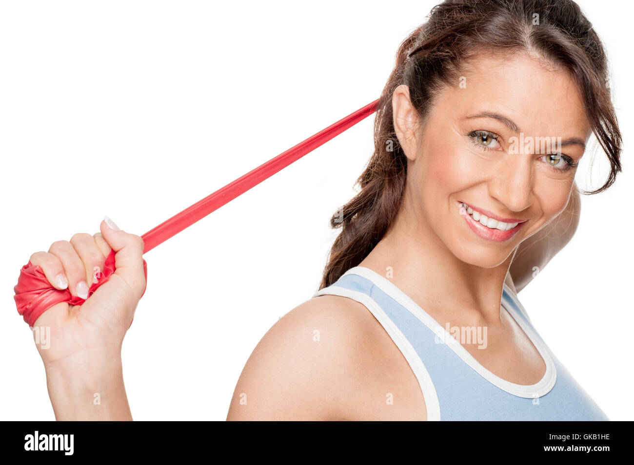 woman with red exercise band Stock Photo - Alamy