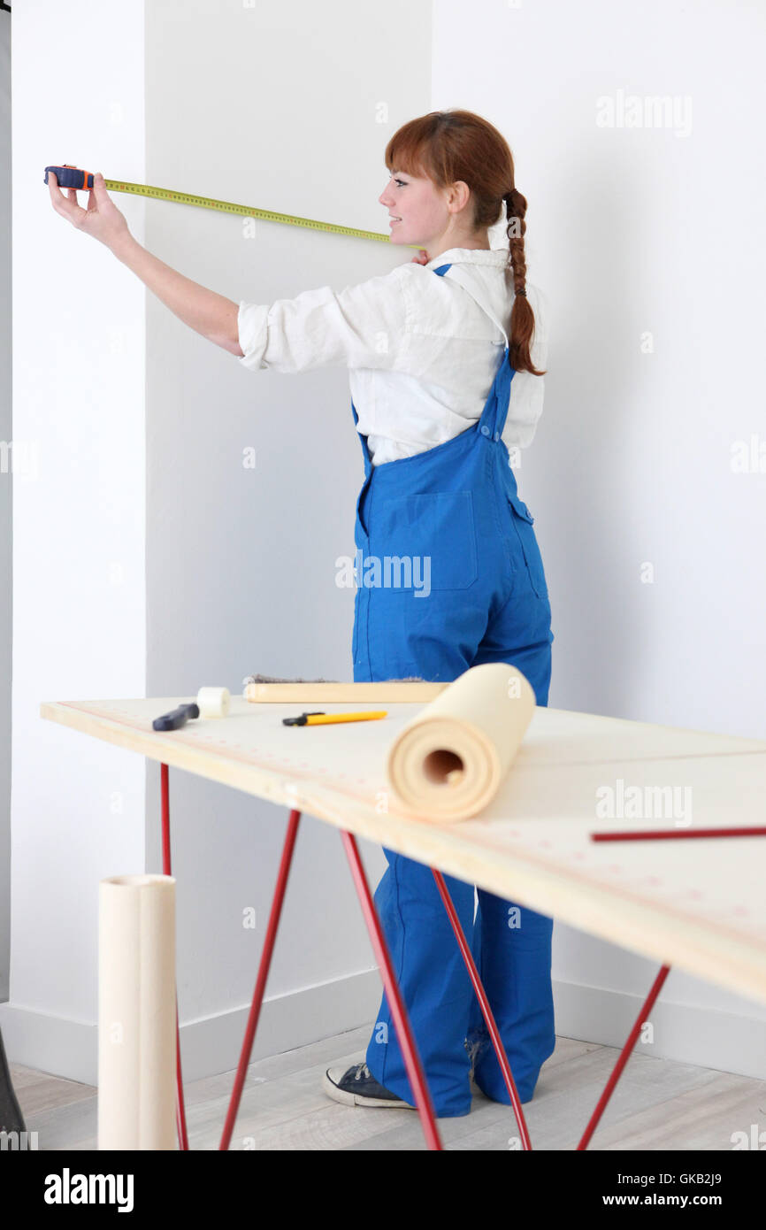 woman house building Stock Photo - Alamy