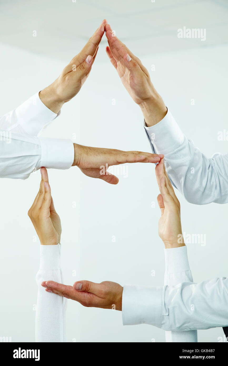 house building hand Stock Photo - Alamy