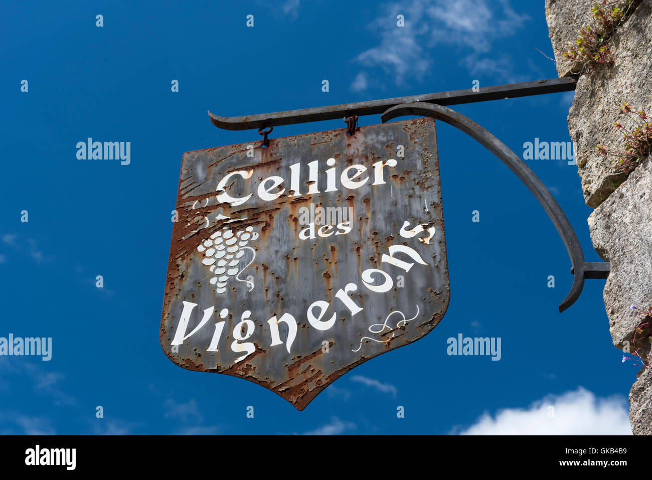Old rusty metal Cellier des Vignerons ( cellar winemakers ) sign ...