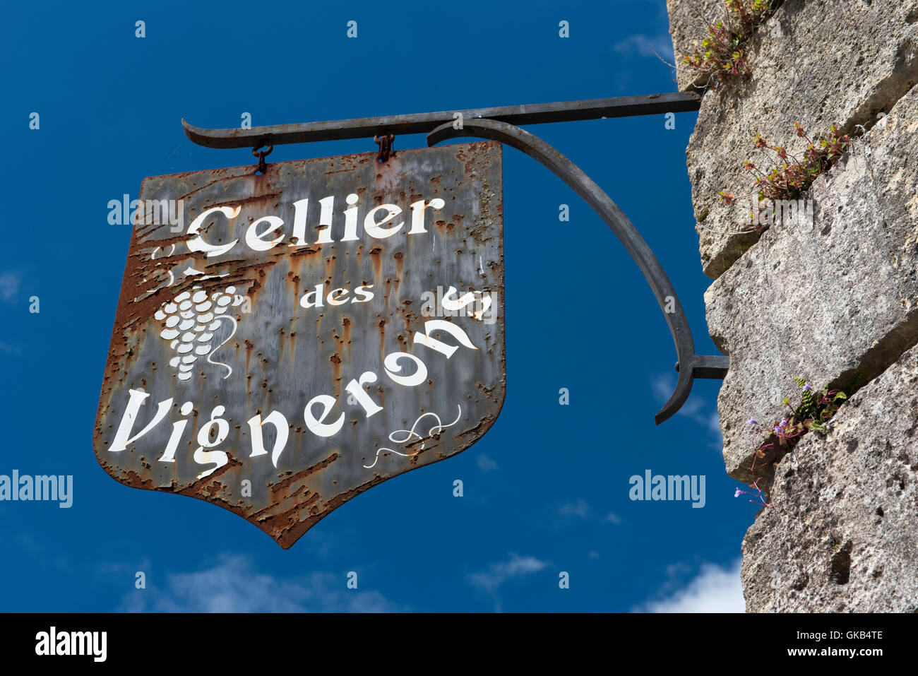 Old rusty metal Cellier des Vignerons ( cellar winemakers ) sign ...