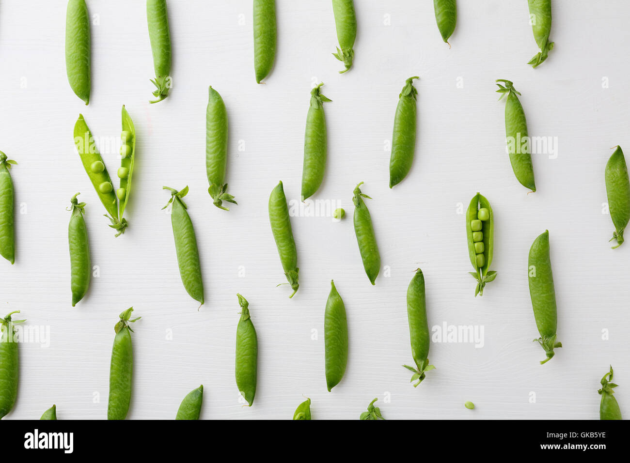 Green peas pattern on wood, food above Stock Photo - Alamy